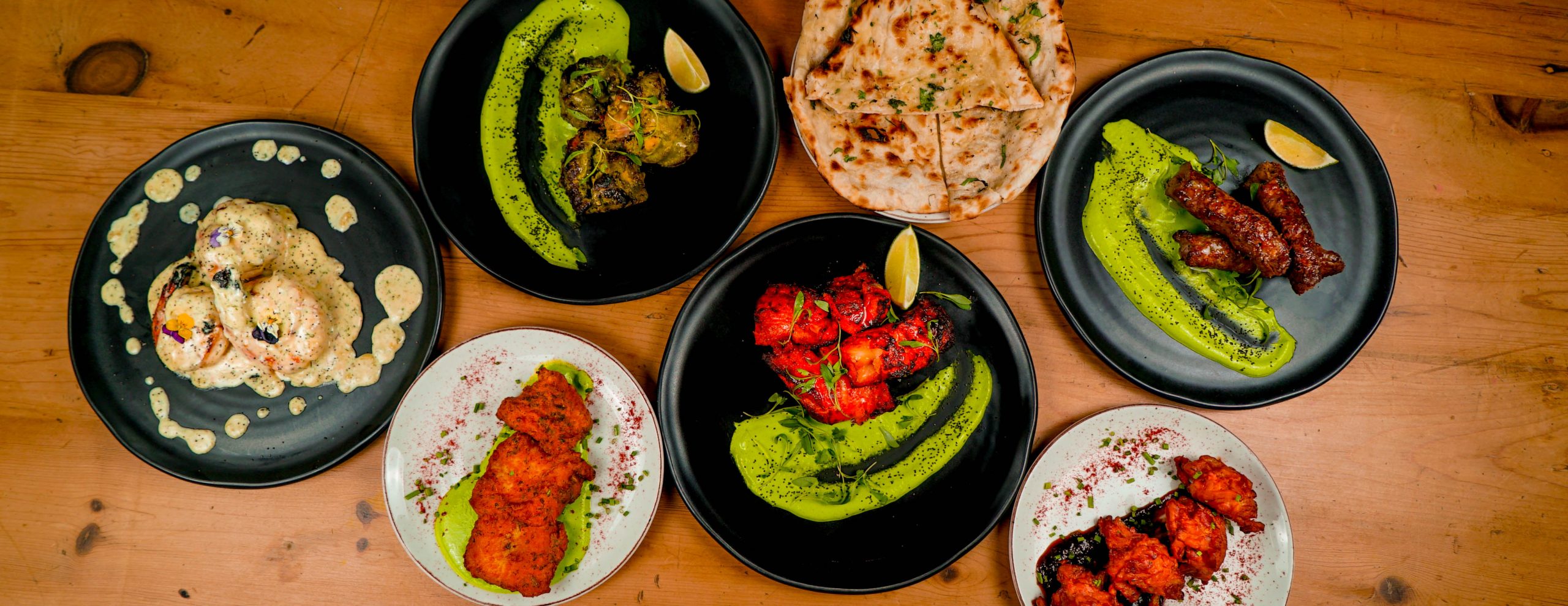 Tapas indiens - poulet tandoori, saumon tikka, crevettes malai...